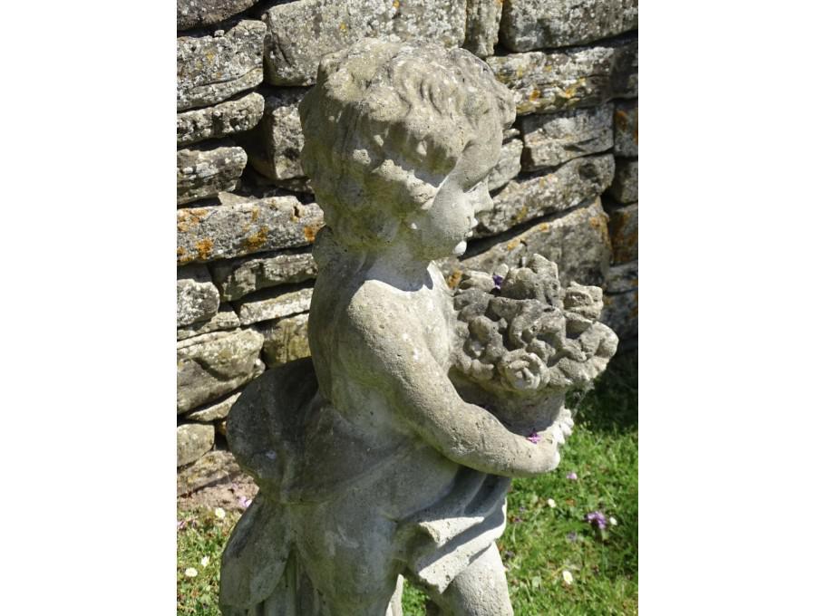 Weathered Stone Putto with Flowers|